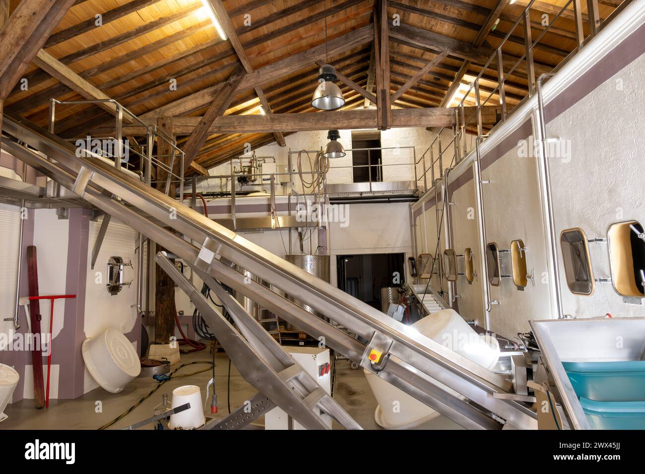 Old concrete tanks for first fermentation of grapes on Bordeaux winery ...