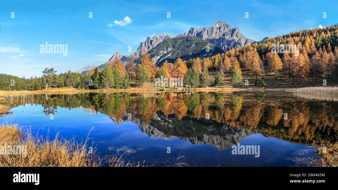 Panorama of the Swiss Alps mountain lake Lai Nair (Black Lake) with ...