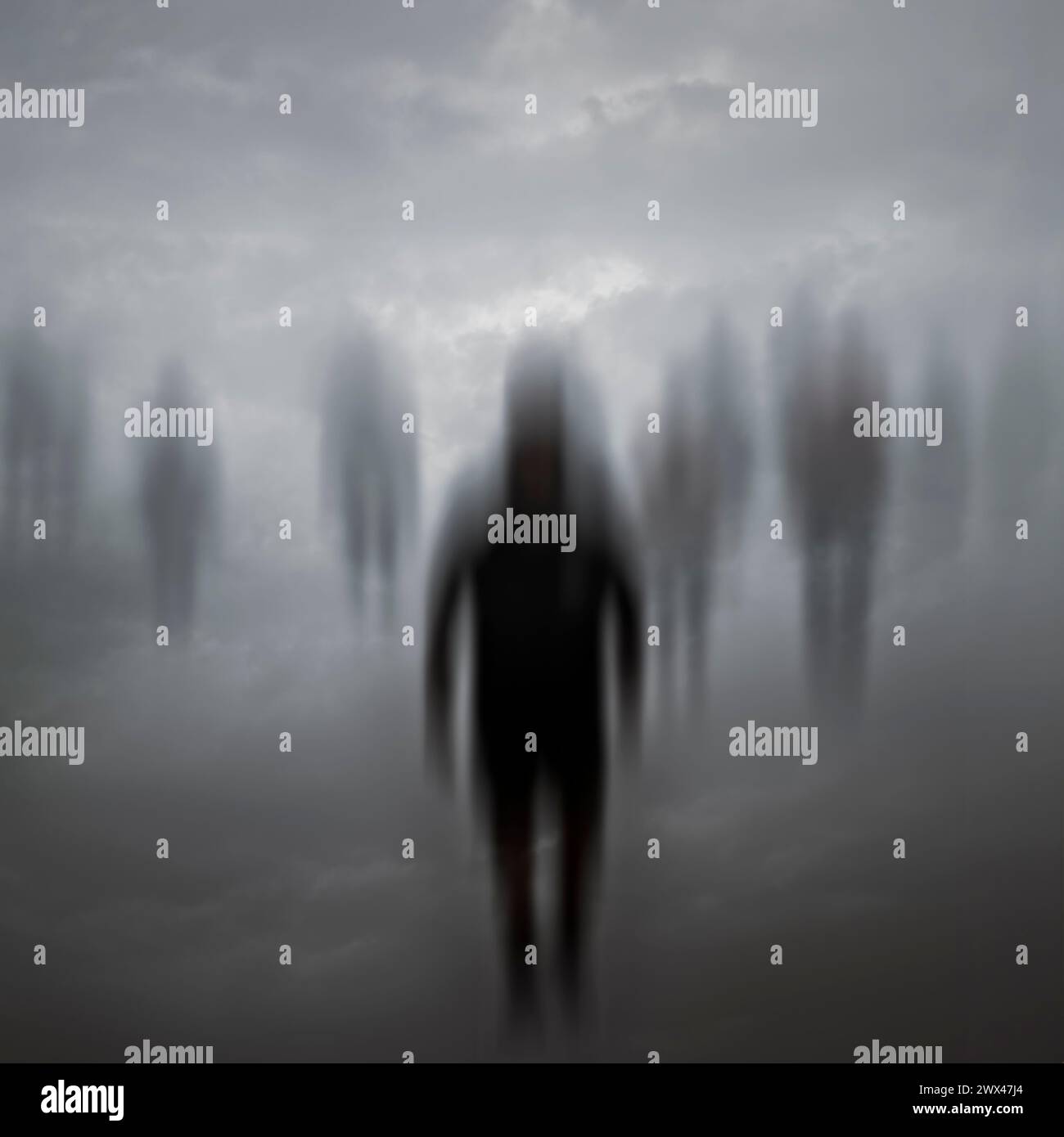 Blurred mysterious people walking in a weird background Stock Photo - Alamy