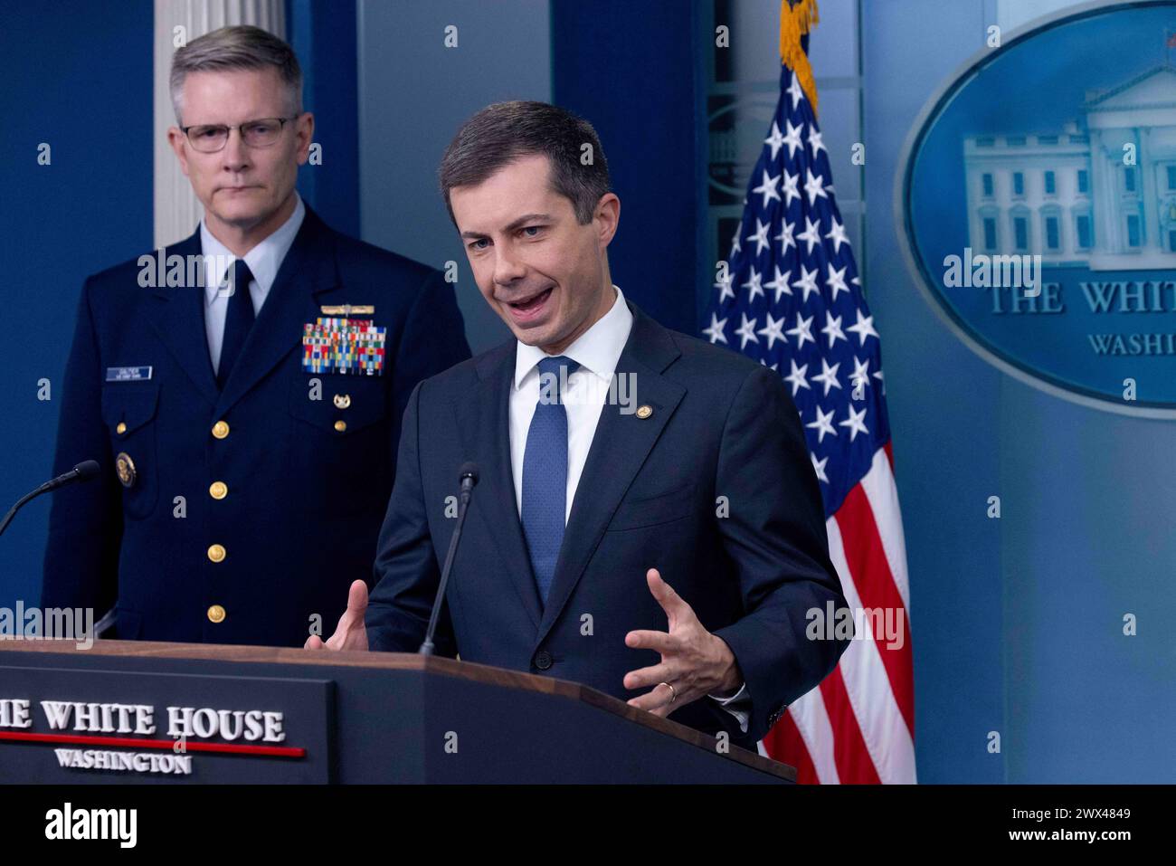 US Secretary of Transportation Pete Buttigieg (R); and Deputy ...