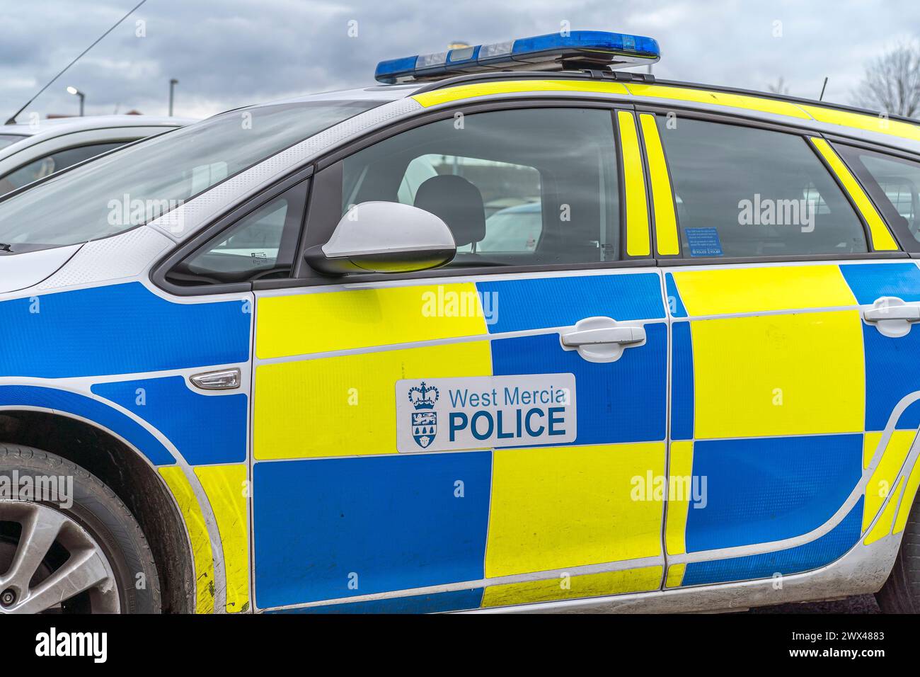 Low angle, side view close up of West Mercia Police car (passenger side ...