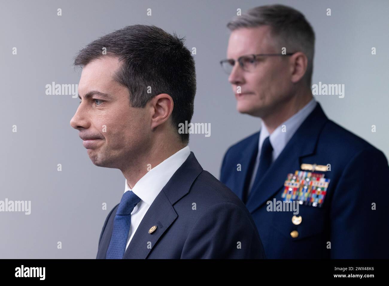 US Secretary of Transportation Pete Buttigieg (L); and Deputy ...