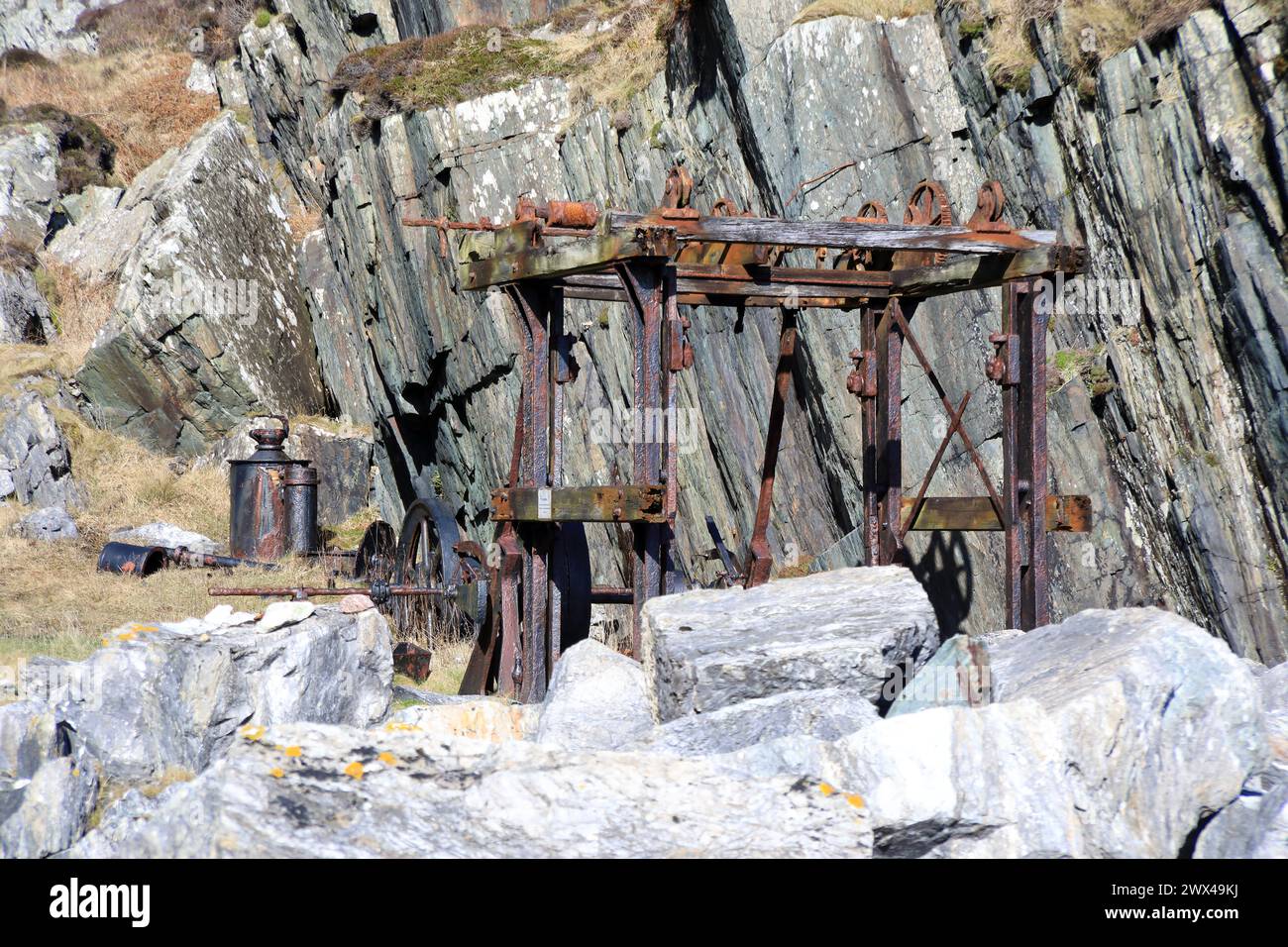 Old rusty equipment at the disused marble quarry on the Isle of Iona in ...