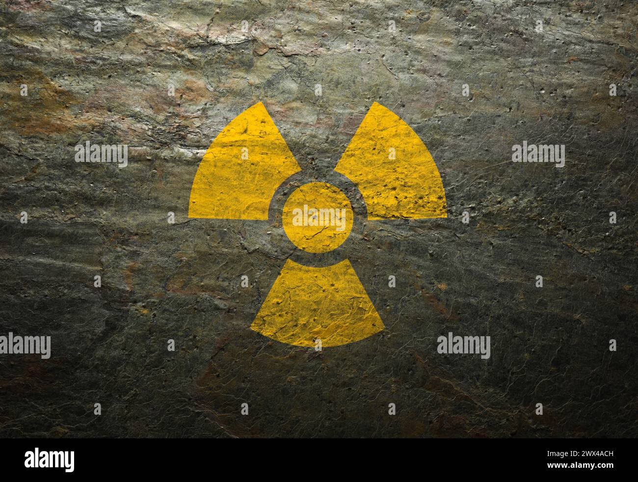 Radioactive sign on grey stone wall. Hazard symbol Stock Photo - Alamy