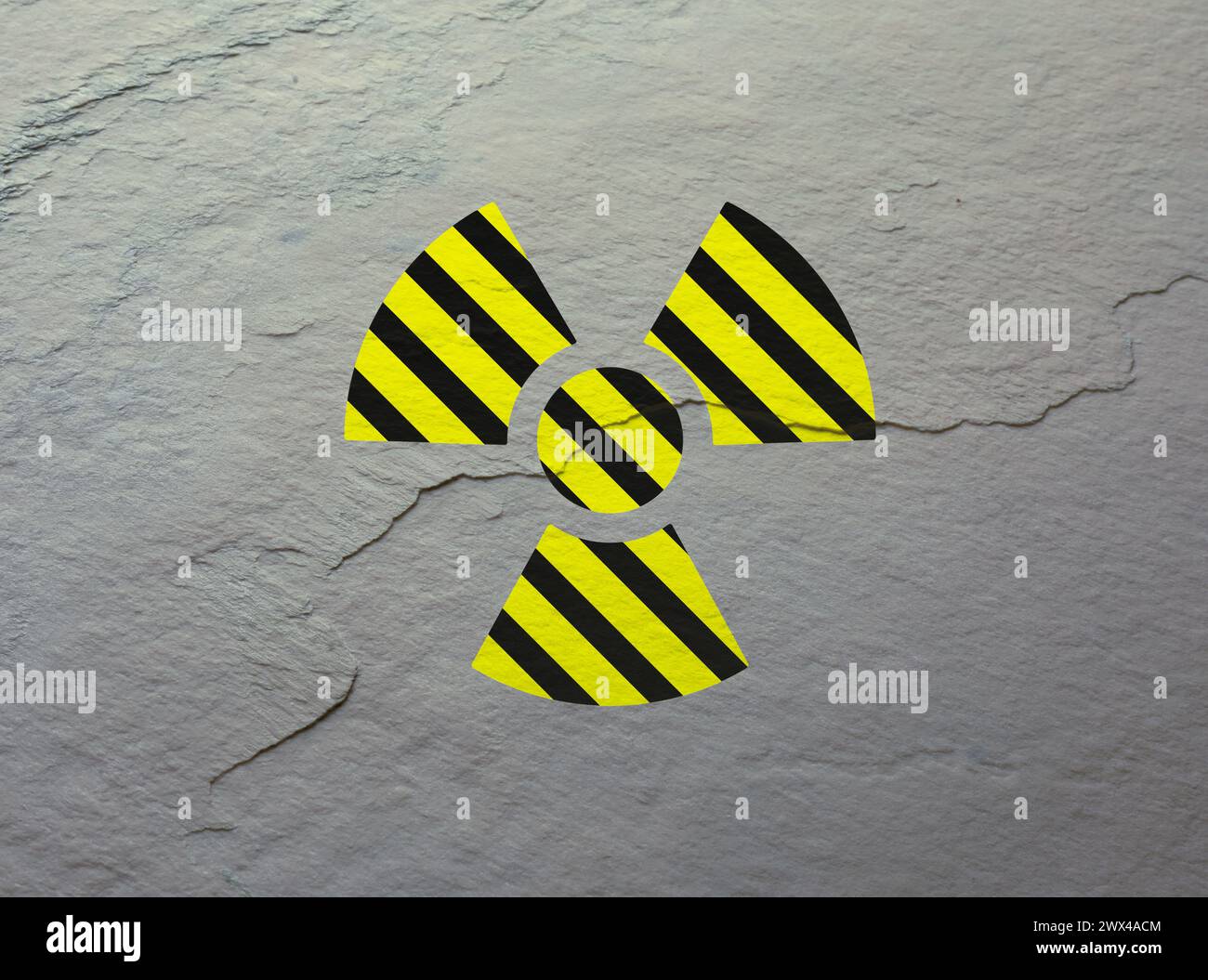 Radioactive sign on light stone wall. Hazard symbol Stock Photo - Alamy