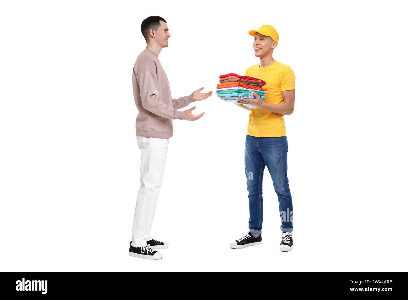 Man delivering laundry hi-res stock photography and images - Alamy