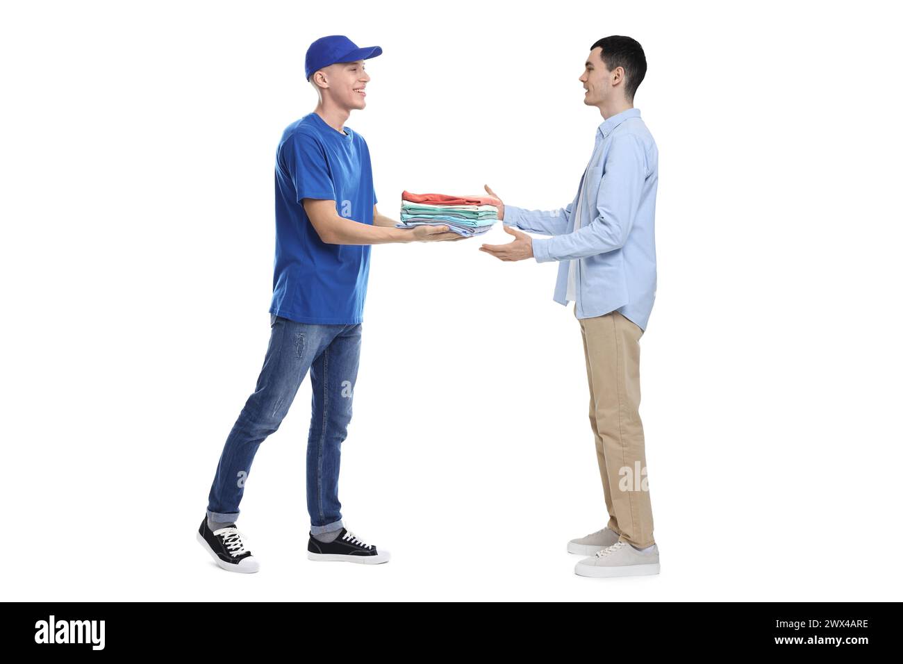 Man delivering laundry hi-res stock photography and images - Alamy