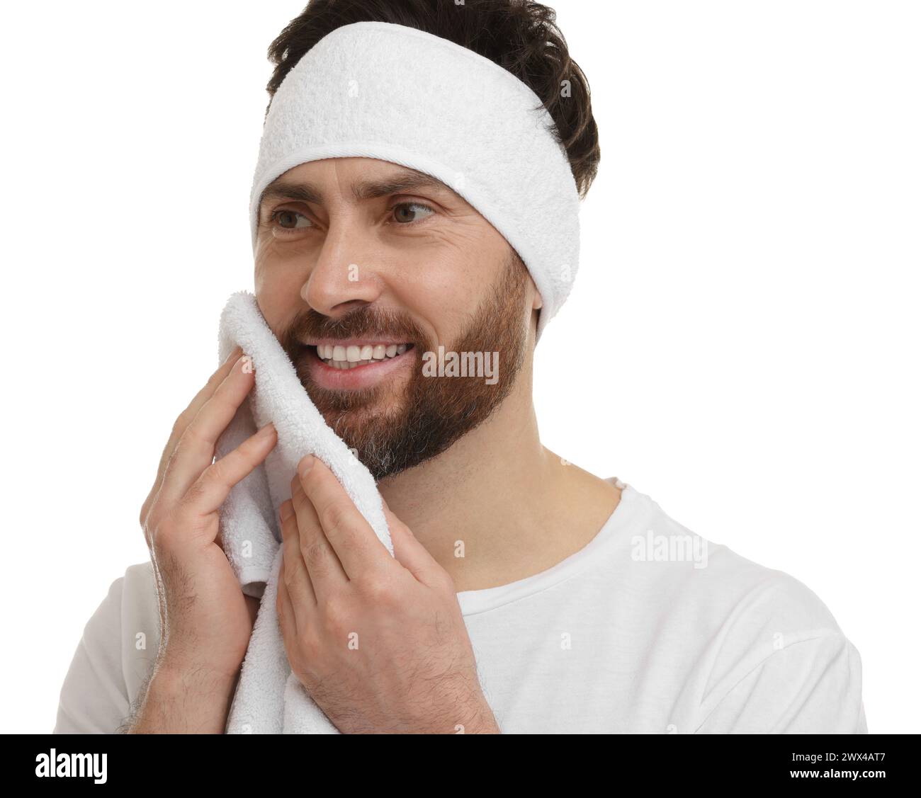 Man wiping face bath towel hi-res stock photography and images - Alamy