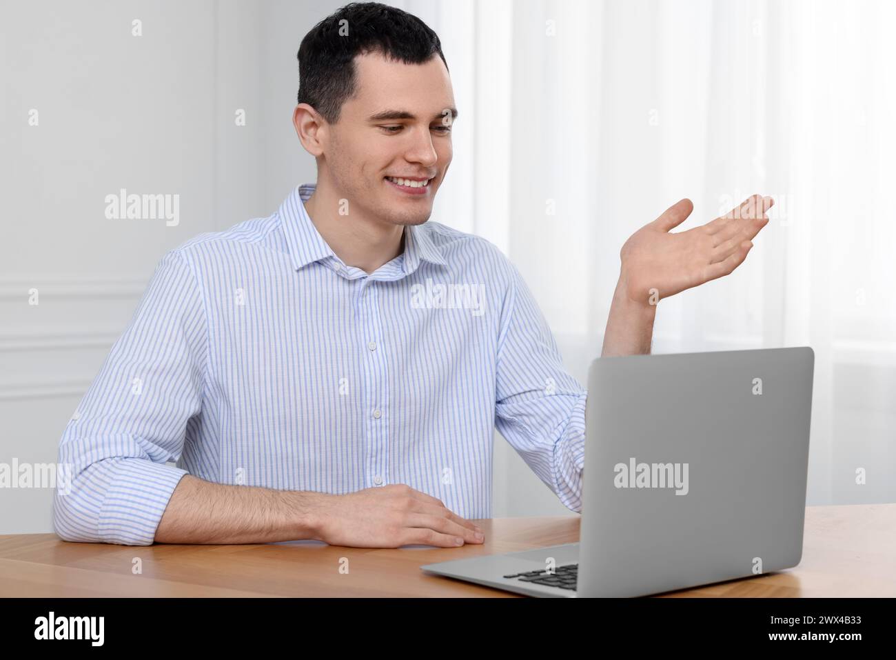 Having video chat on laptop hi-res stock photography and images - Alamy