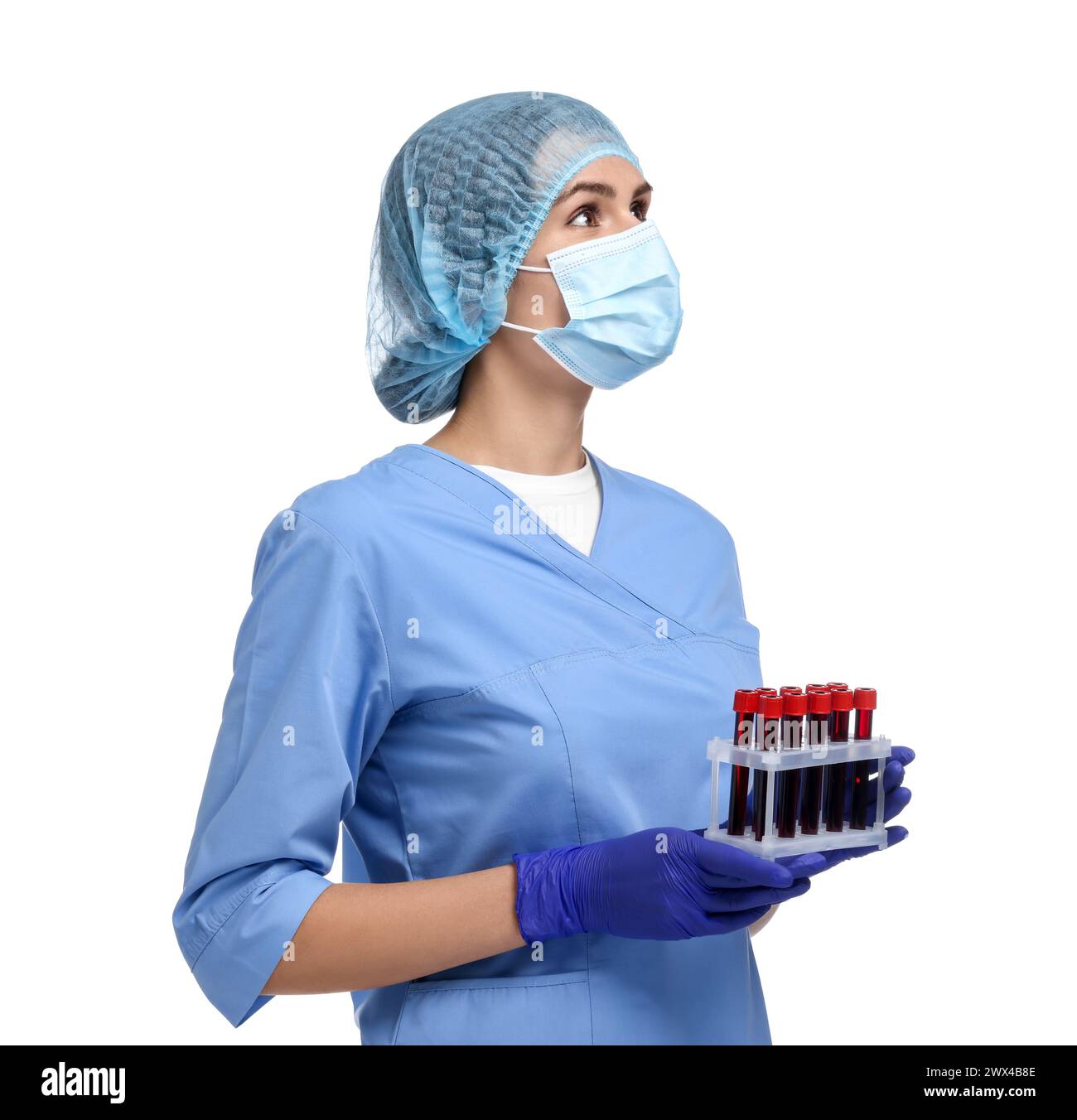 Laboratory testing. Doctor with blood samples in tubes on white ...