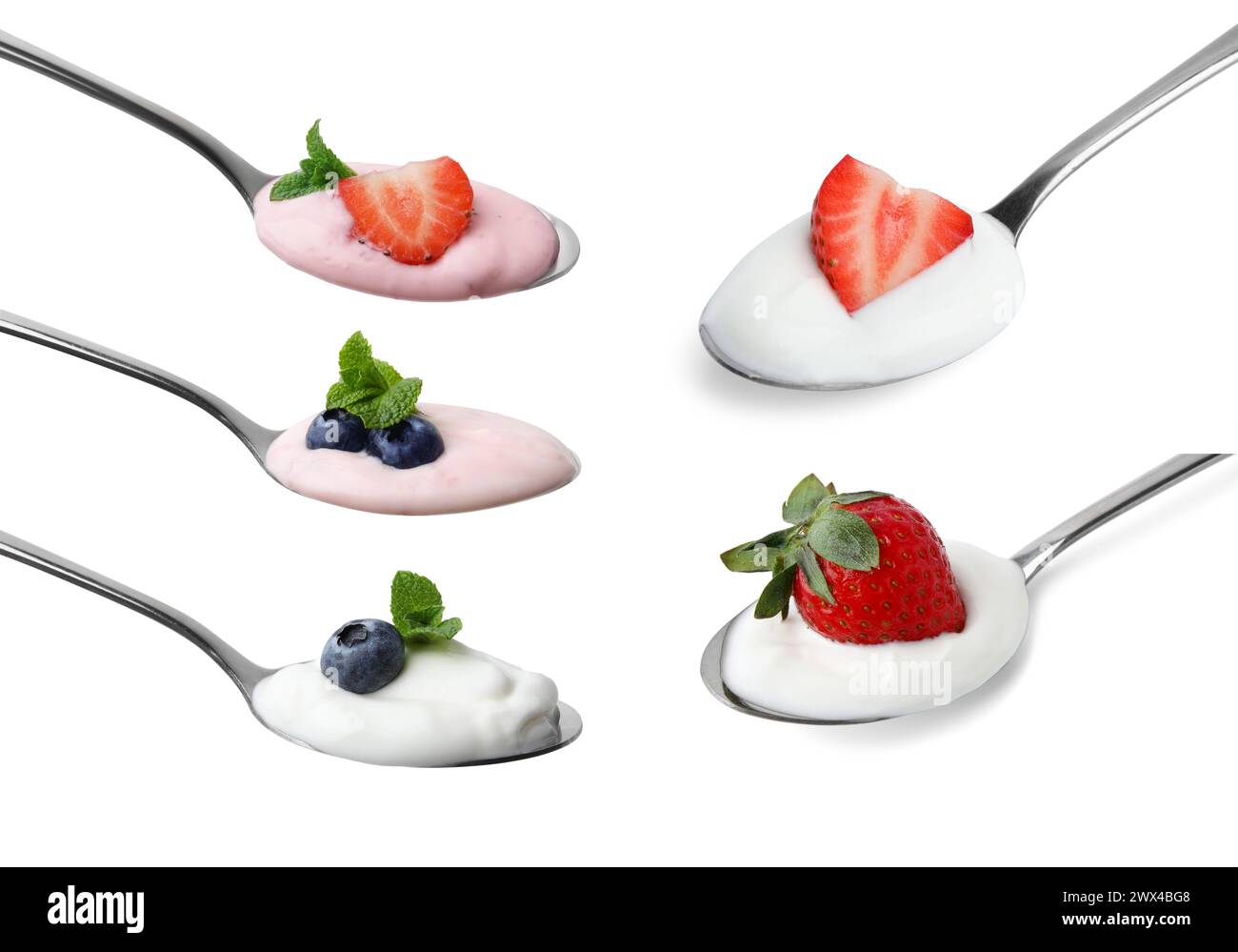 Different delicious yogurts in spoons isolated on white, set Stock ...