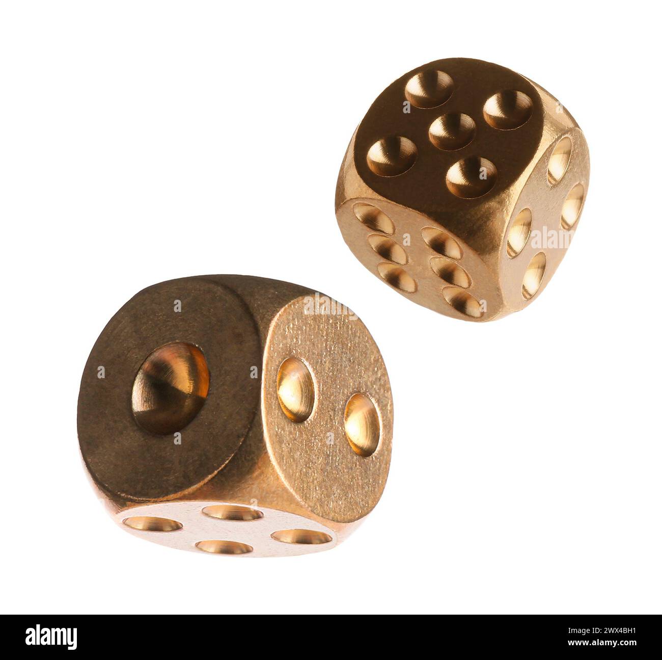 Golden dice in air on white background Stock Photo - Alamy