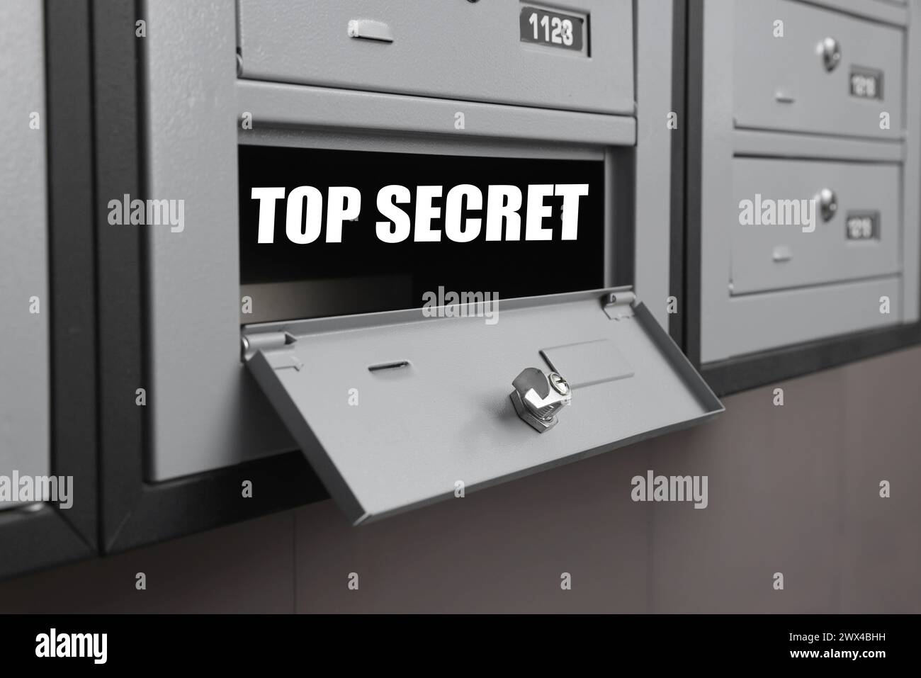 Top Secret stamp. Open metal mailbox indoors Stock Photo - Alamy