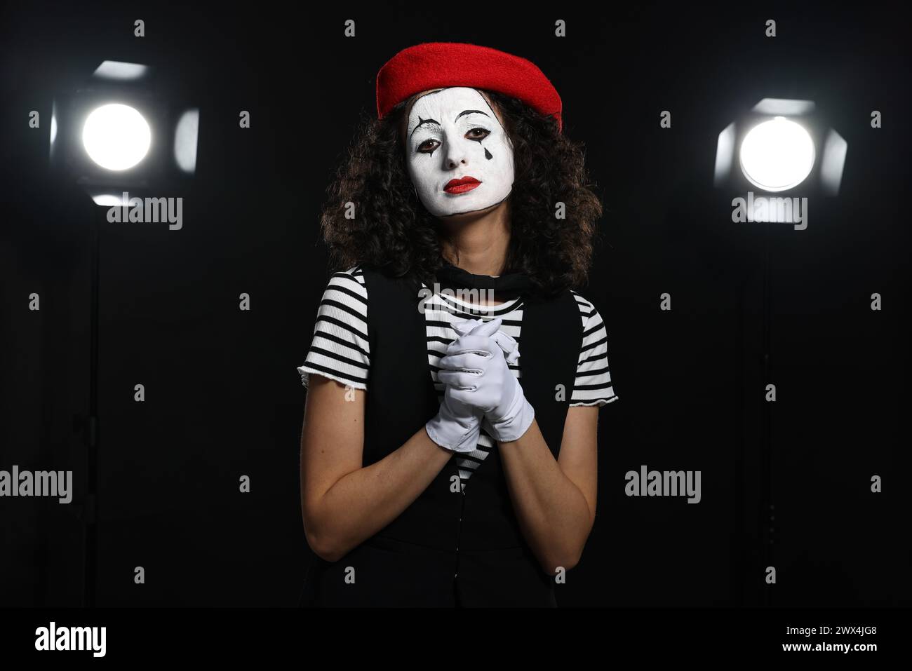 Young woman in mime costume performing on stage Stock Photo - Alamy