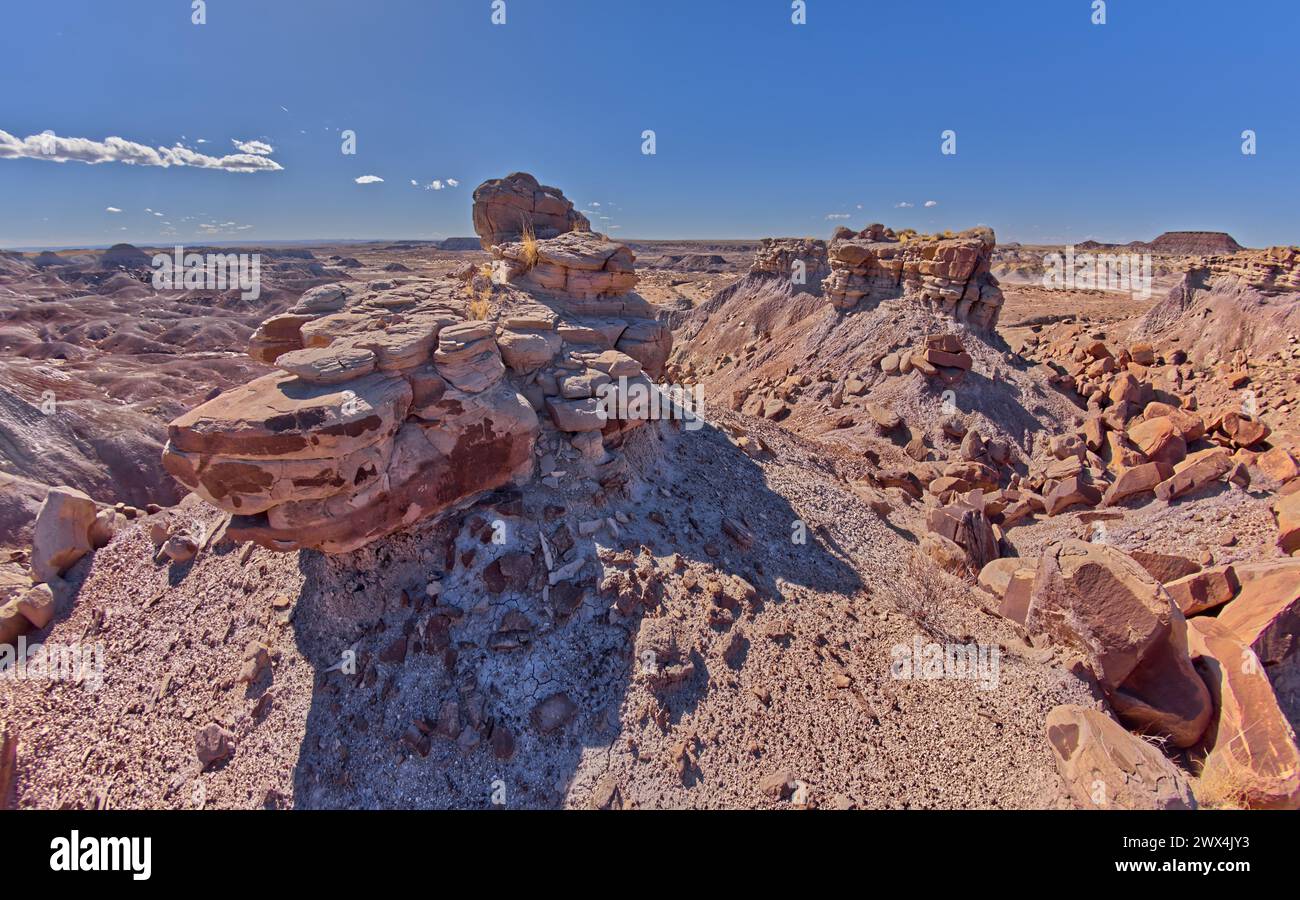 Rock islands above the purple badlands near Hamilili Point on the south ...