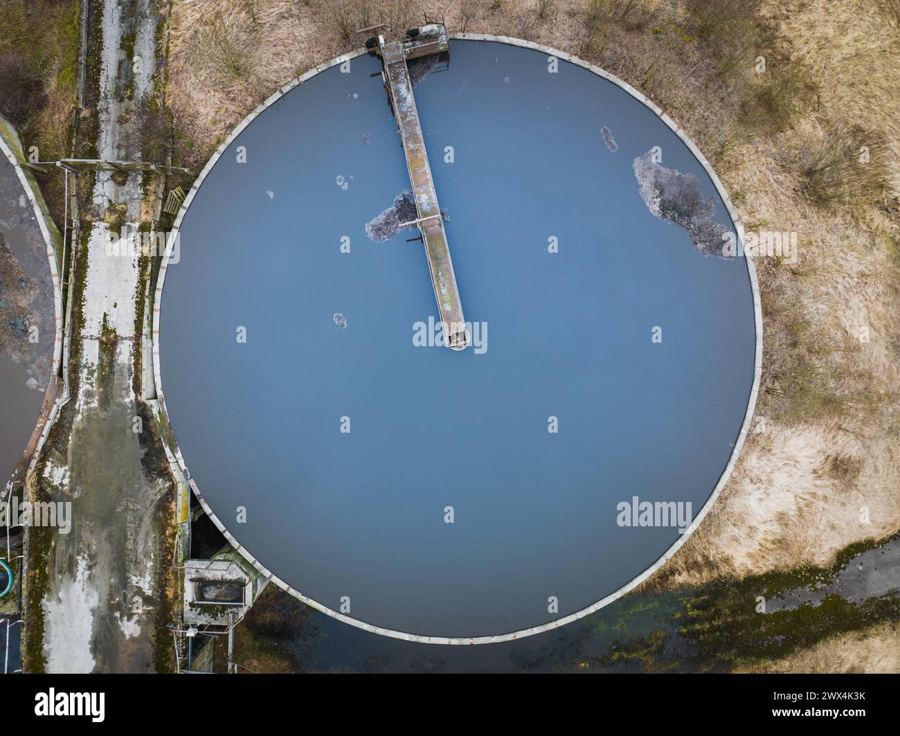 Old water treatment plant, primary settling tanks, drone aerial view ...