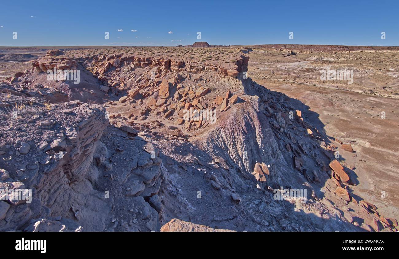 The crumbling cliffs of a mesa near Hamilili Point on the south end of ...