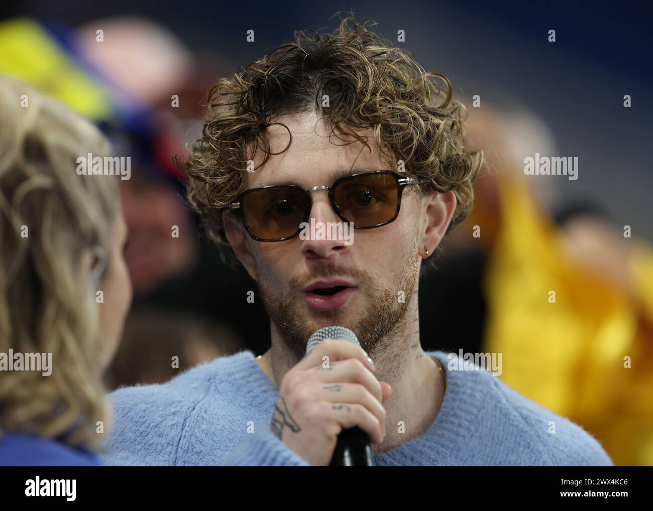 London, UK. 27th Mar, 2024. Singer Tom Grennan talks before the UEFA ...