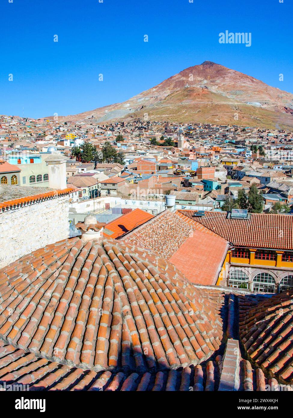 A view of the iconic Cerro Rico mountain looming over the terracotta ...