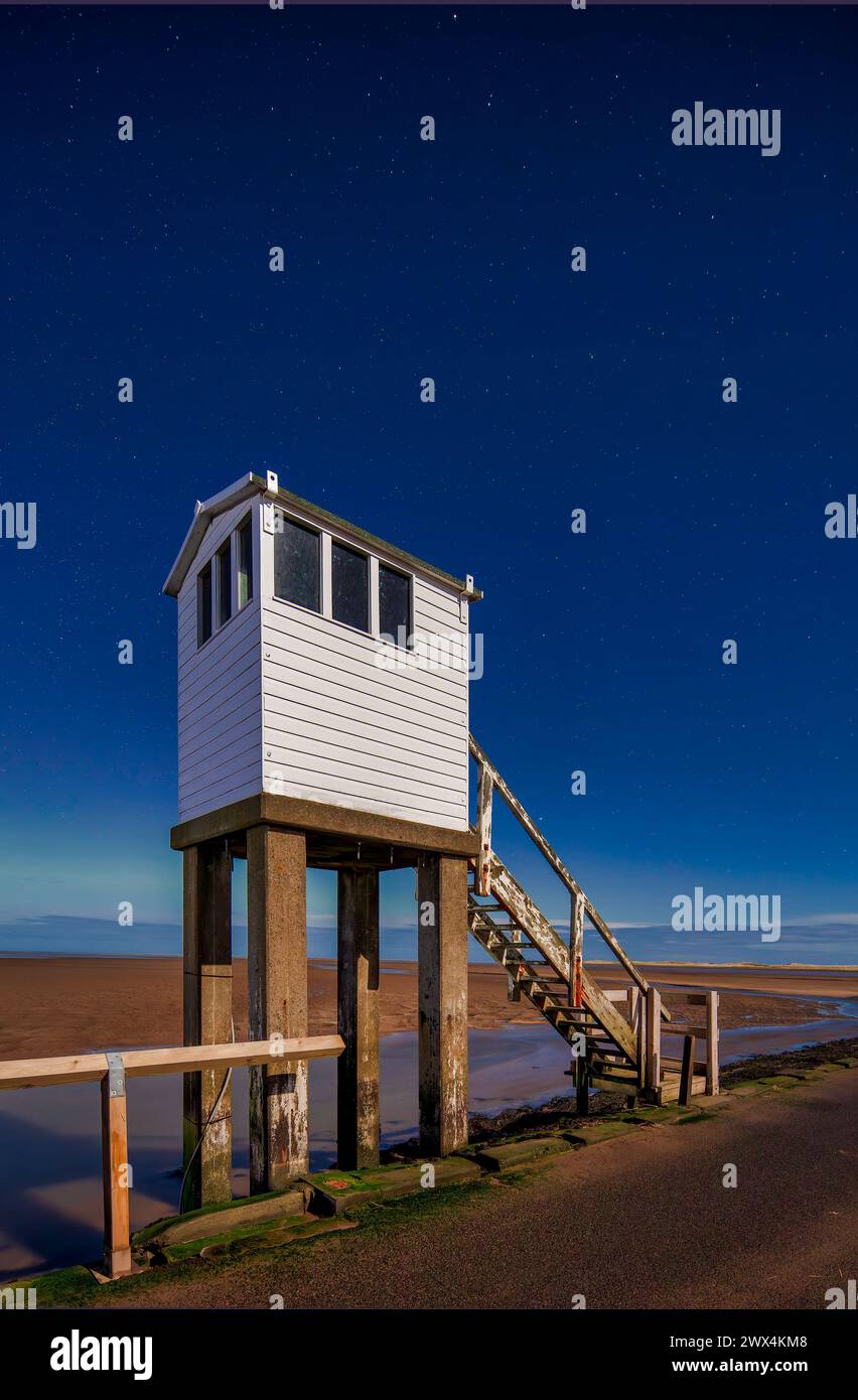 A view at night under moonlight with a clear sky and the northern ...