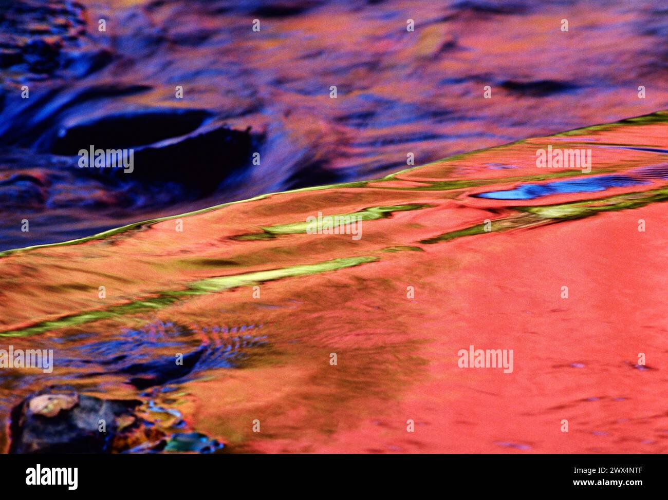 Colorful reflection of the red Pine Valley Covered Bridge in the falls ...