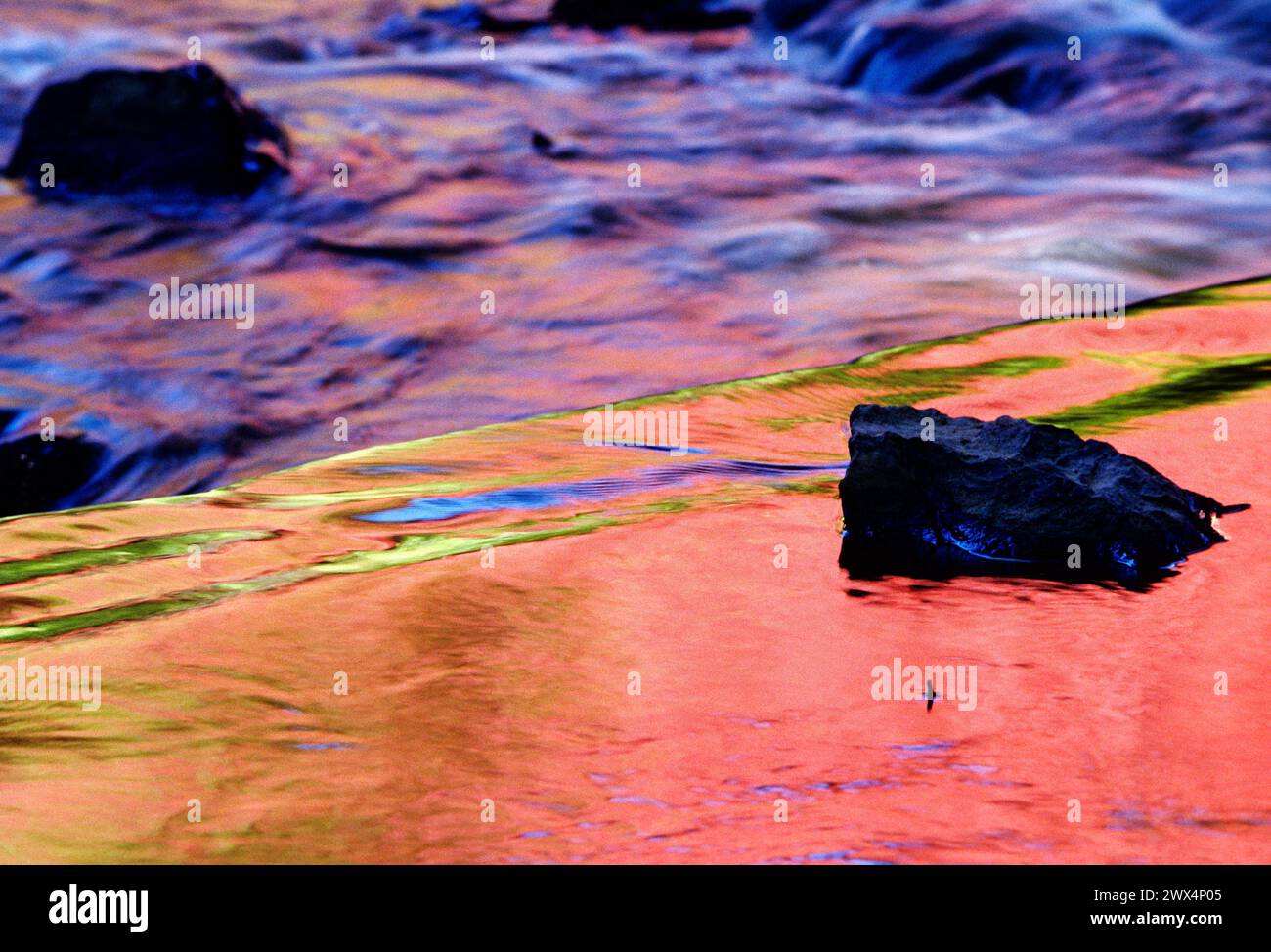 Colorful reflection of the red Pine Valley Covered Bridge in the falls ...