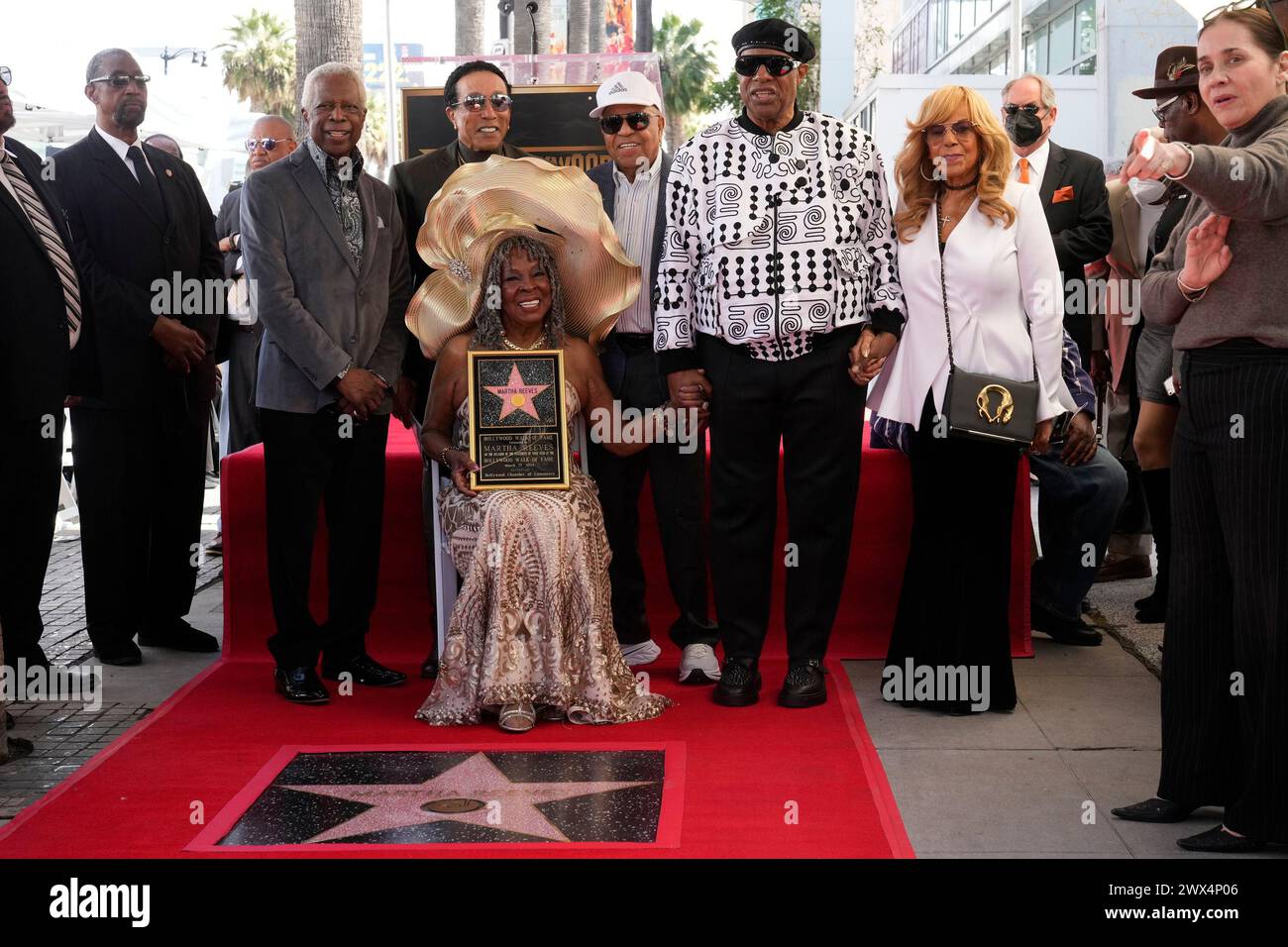 Standing on the red carpet from left, William "Mickey" Stevenson ...