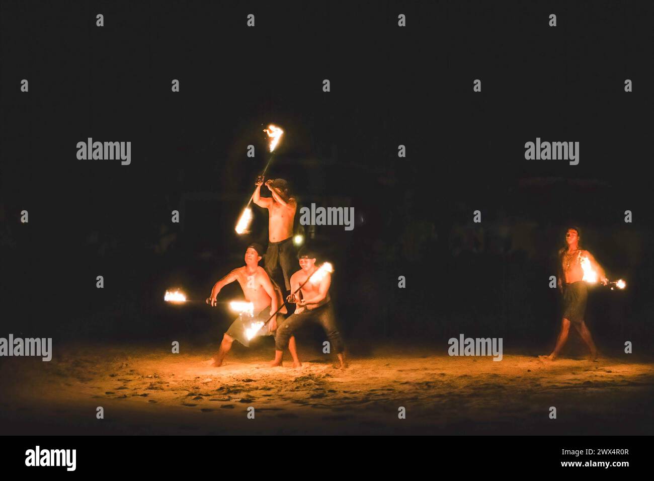 Koh Chang, Thailand. 03rd Jan, 2024. A group of acrobatics fire dancers ...