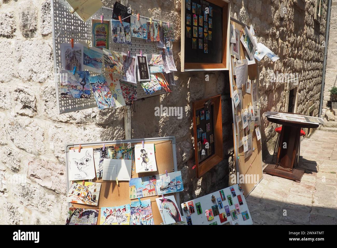 Kotor, Montenegro, August 11, 2022: souvenir cards, drawings, pictures ...