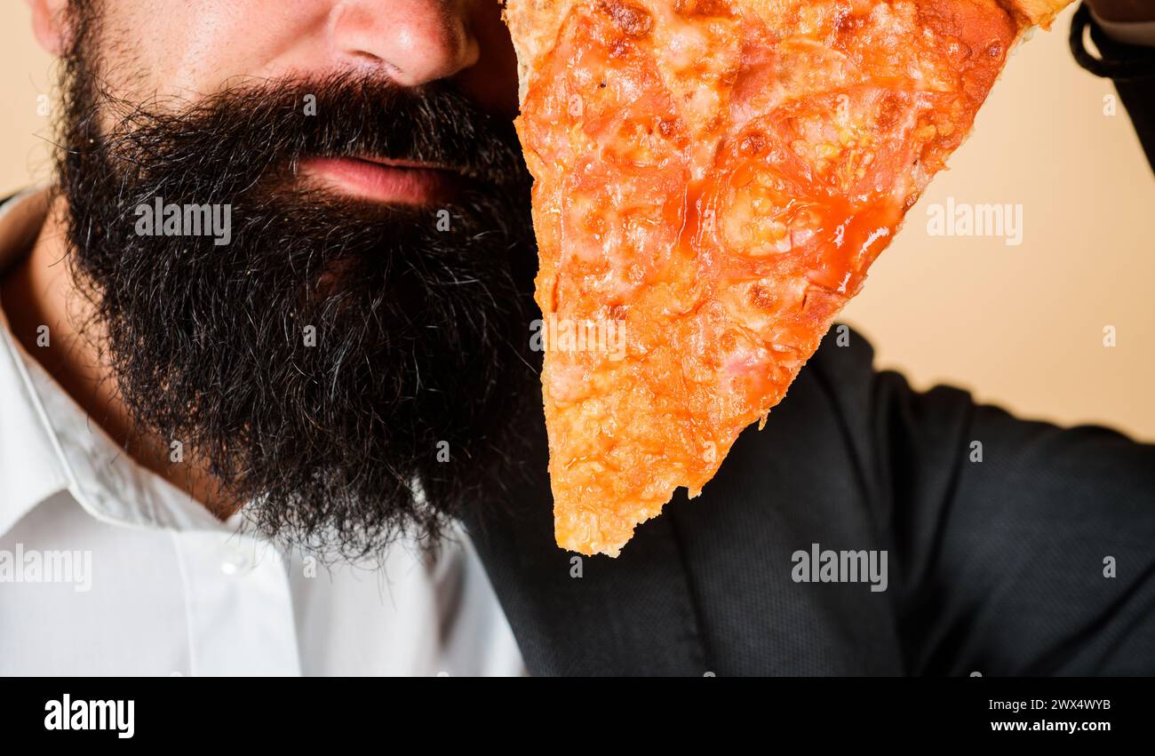 Cropped portrait of bearded man with slice of delicious pizza. Closeup ...