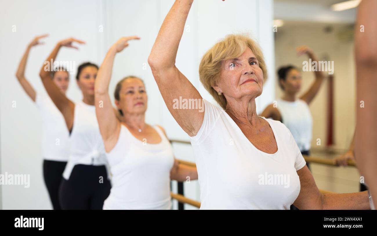 Group of women doing ballet dance moves Stock Photo - Alamy