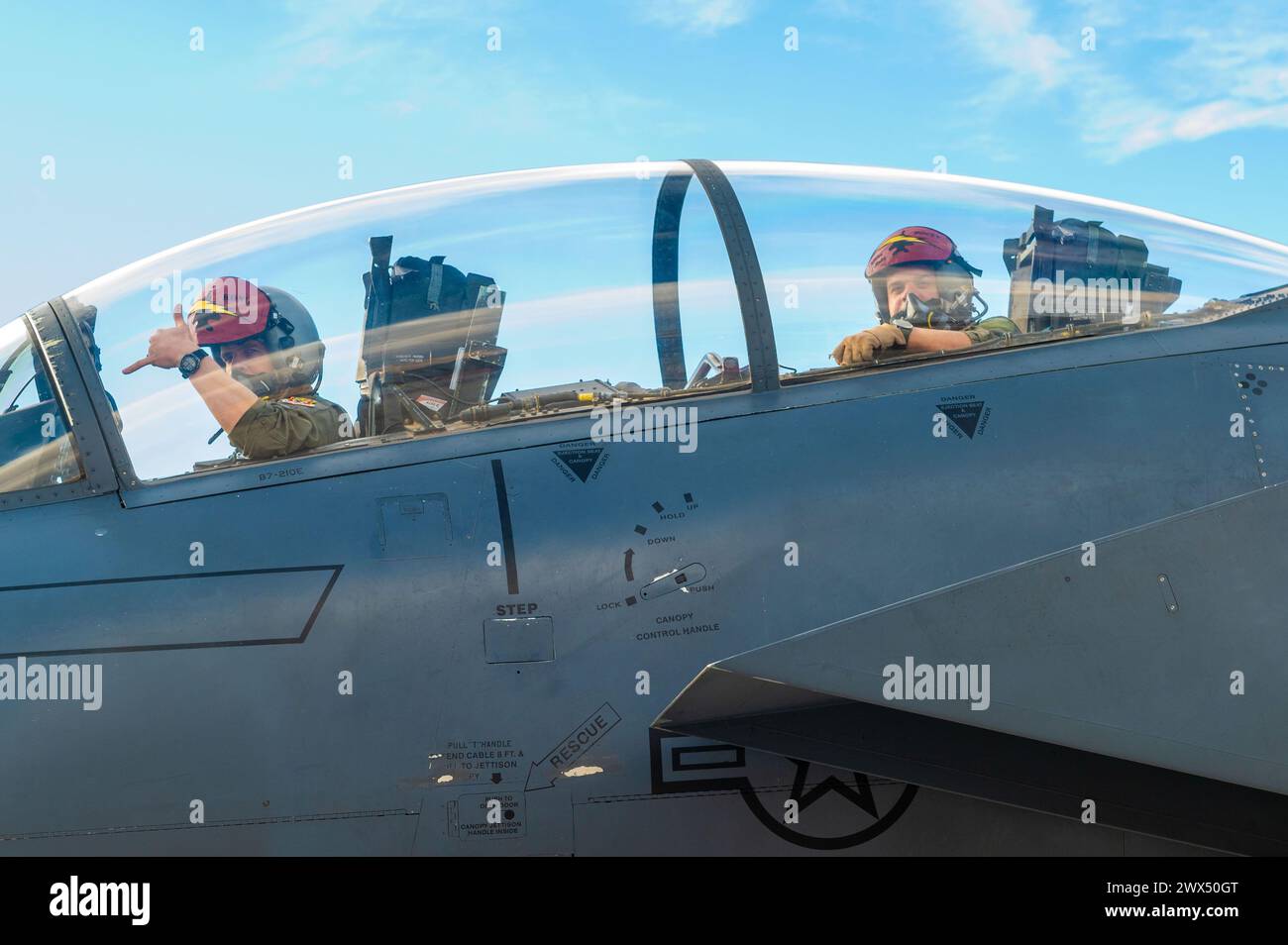 U.S. Air Force F-15E Strike Eagle pilots return from a flight in ...