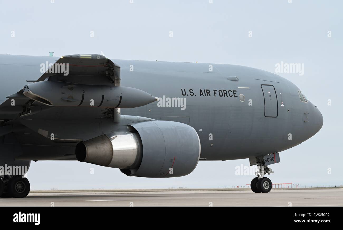 A KC-46A Pegasus with Wing Aerial Refueling Pods attached taxis on the ...