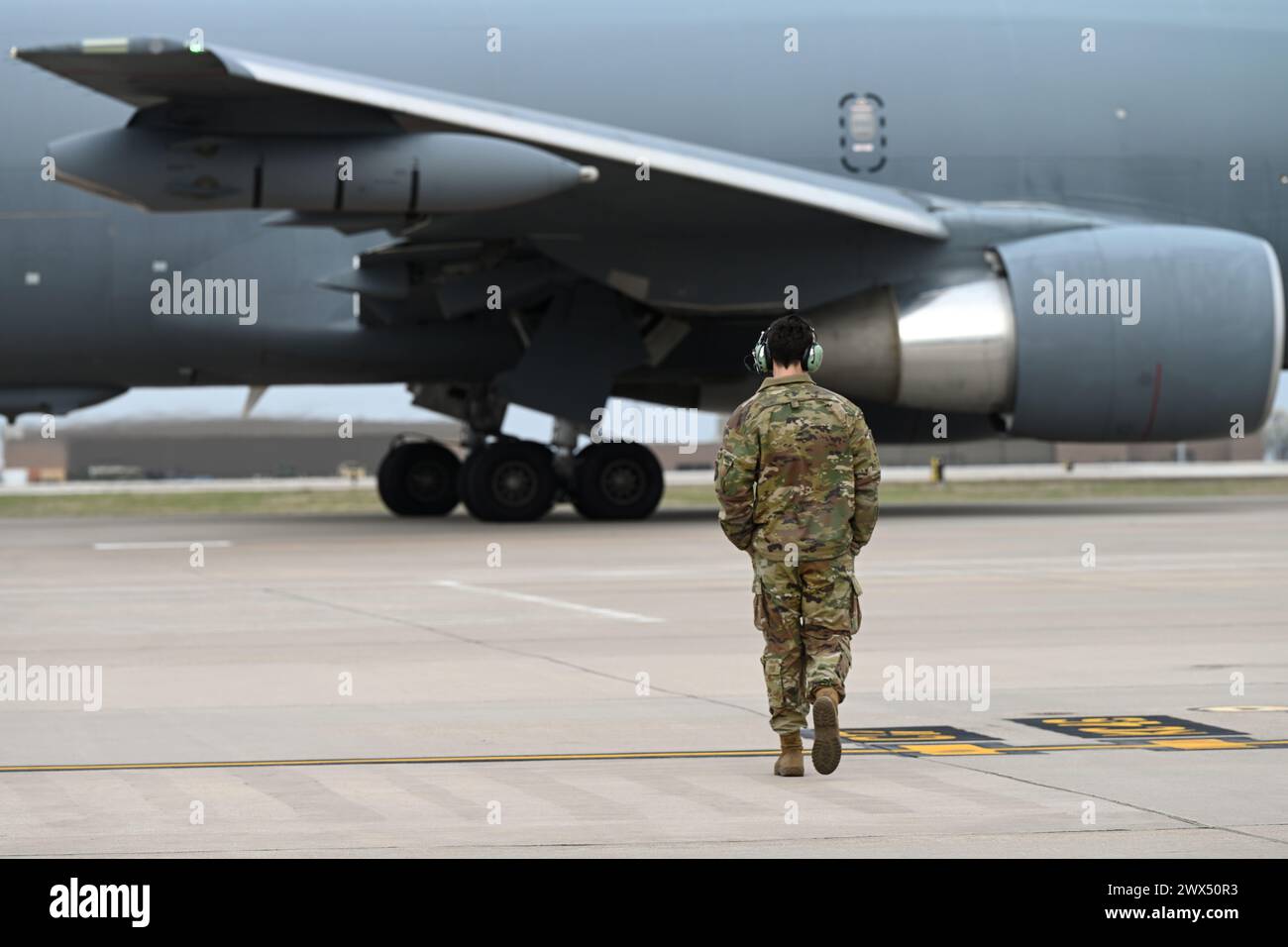 An Airman assigned to the 22nd Aircraft Maintenance Squadron walks ...