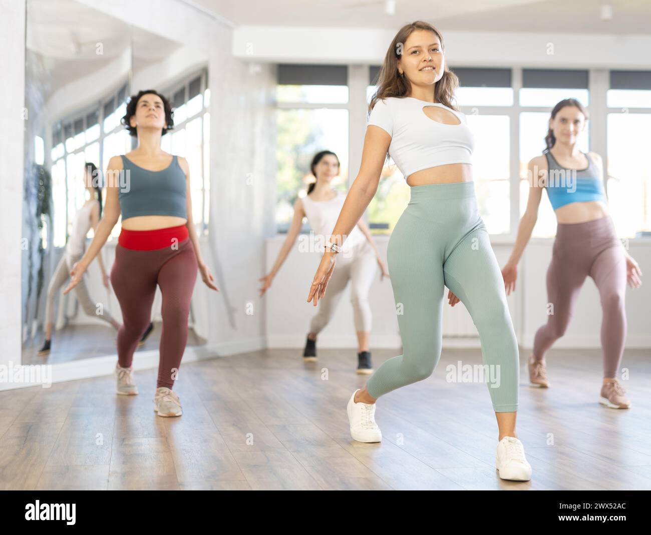 Group of women dancing dancehall in studio Stock Photo - Alamy