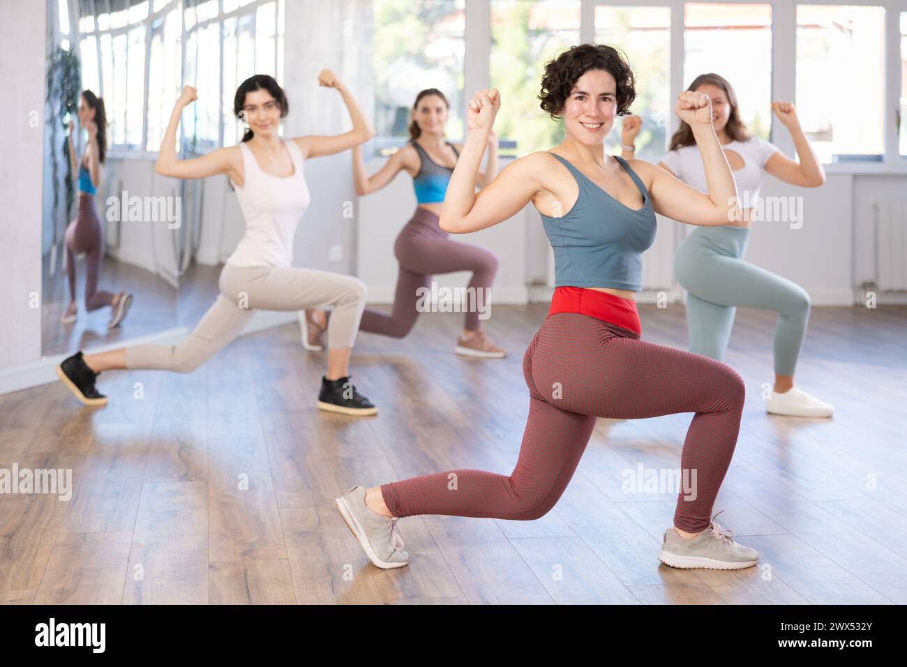 Female teacher conducts modern dance lessons for group of girls Stock ...