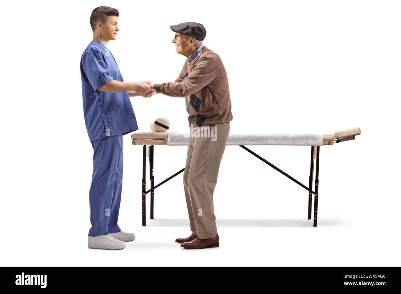 Health care worker giving support to an elderly patient and hoilding ...