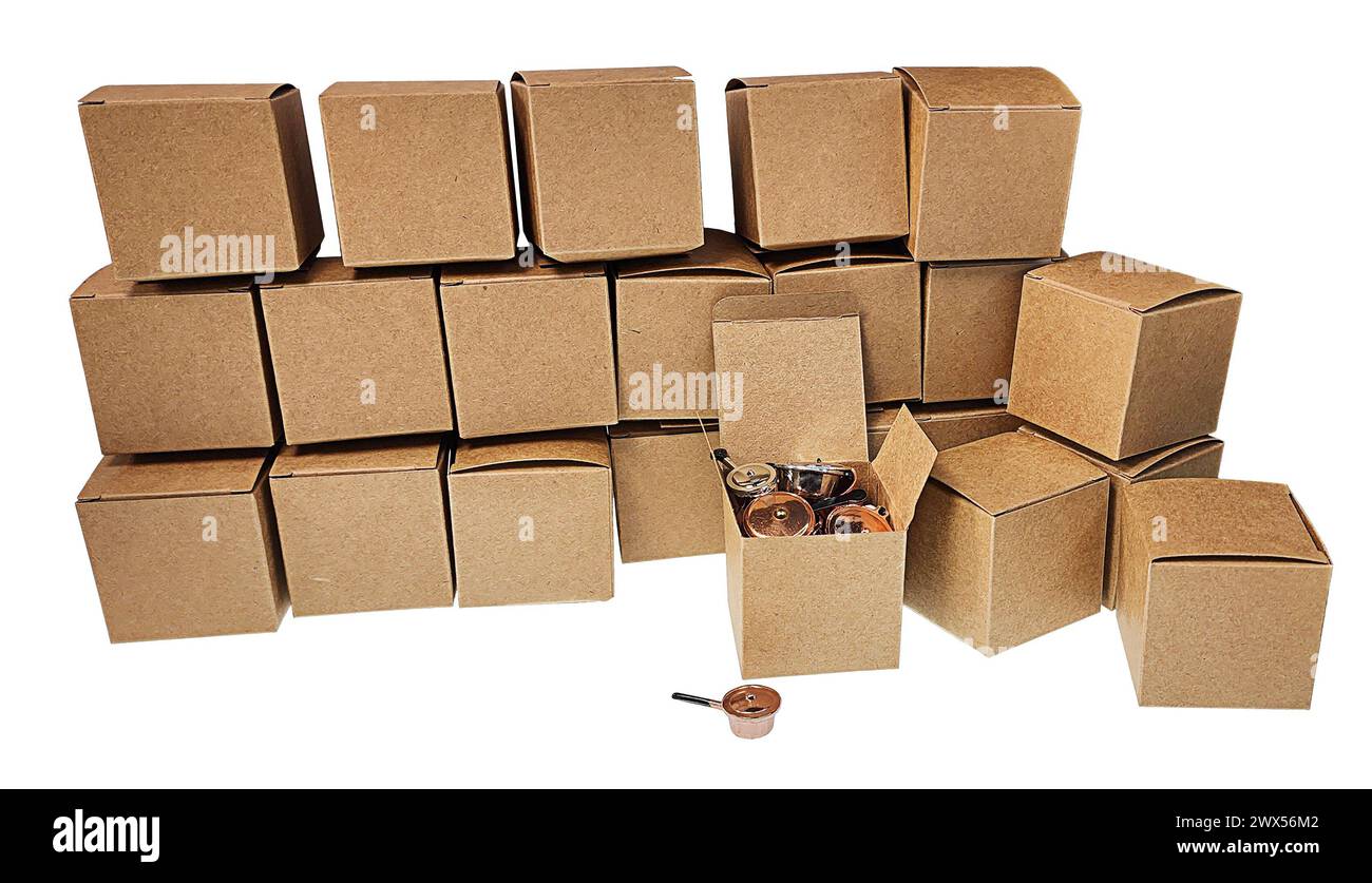 Packing or unpacking box of pots and pans for a move Stock Photo - Alamy