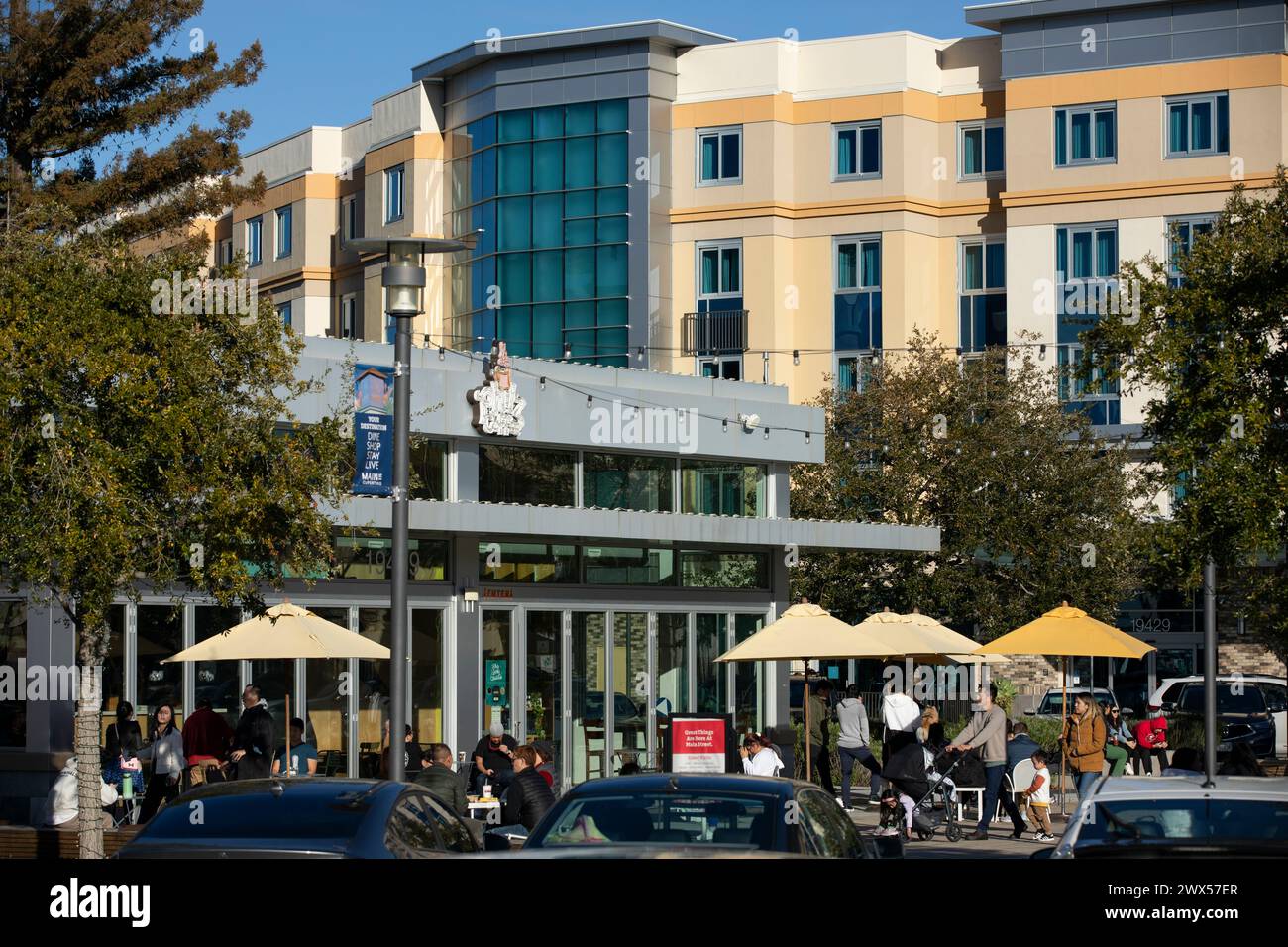 Cupertino, California, USA - January 1, 2023: People stroll and eat at ...