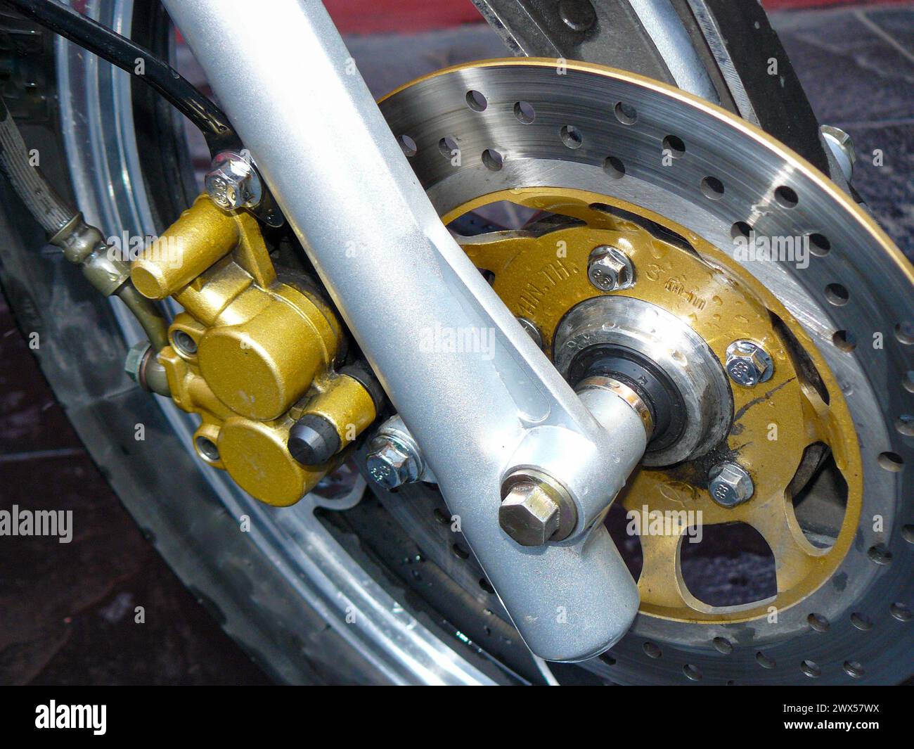 disc brake and caliper of a motorcycle wheel Stock Photo - Alamy