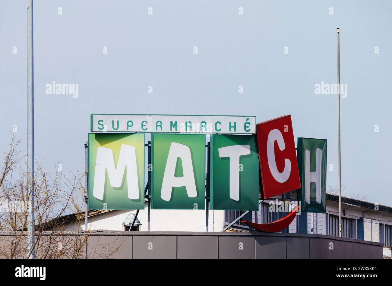 Haguenau, France - Mar 20, 2024: Atop a building in a French city, the ...