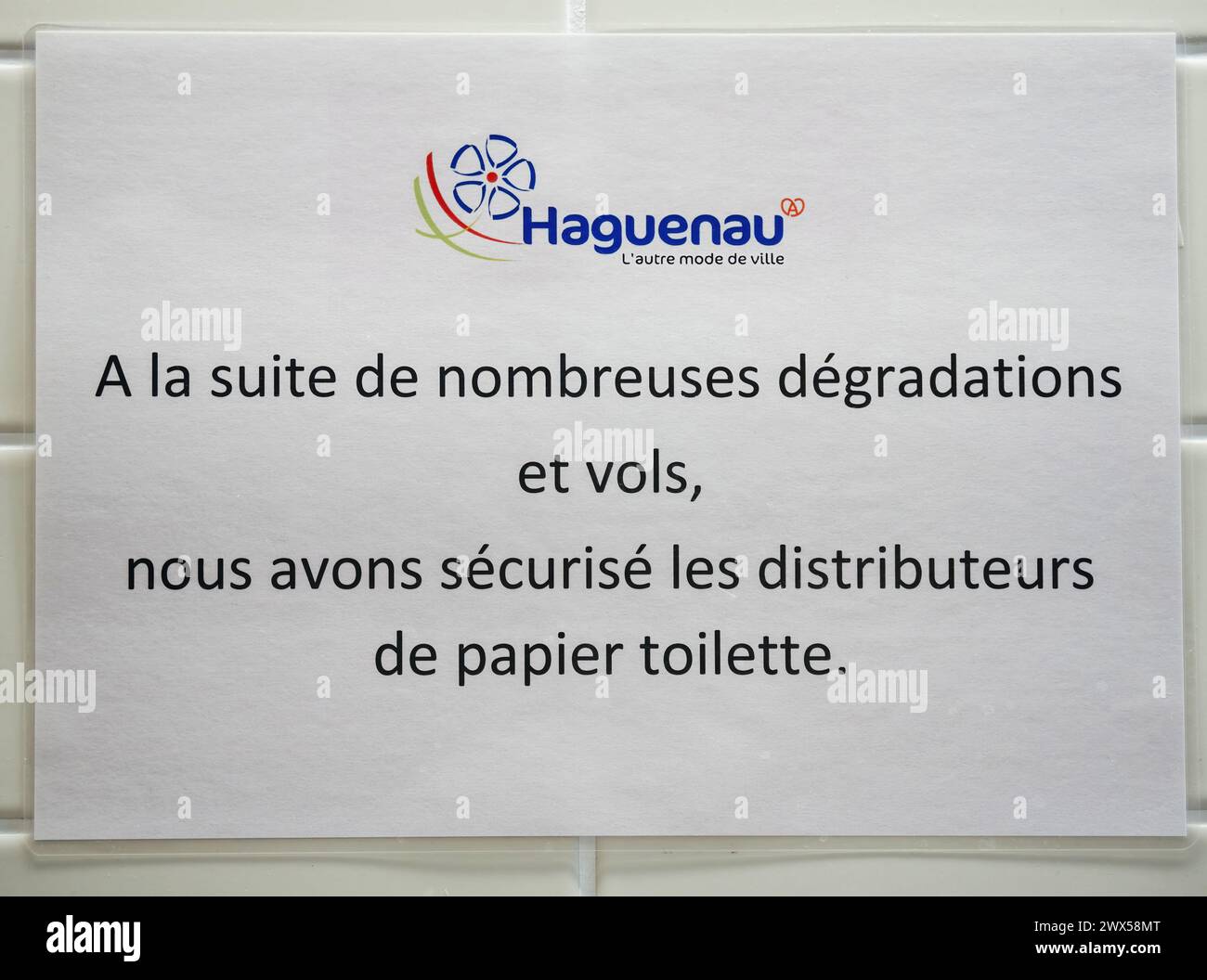Haguenau, France - Mar 20, 2024: A notice states that toilet paper ...