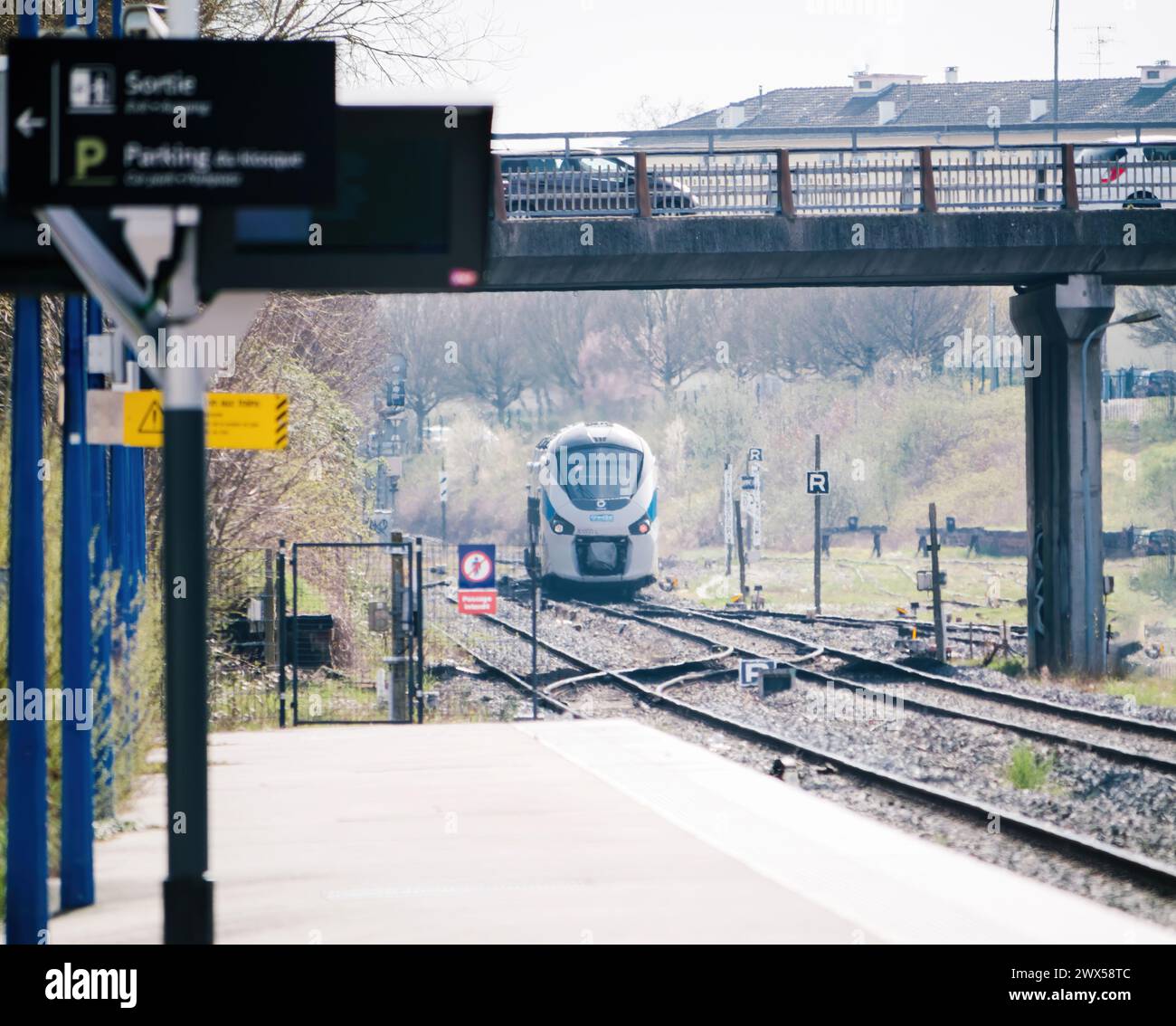 Haguenau, France - Mar 20, 2024: A SNCF train is seen traveling down ...