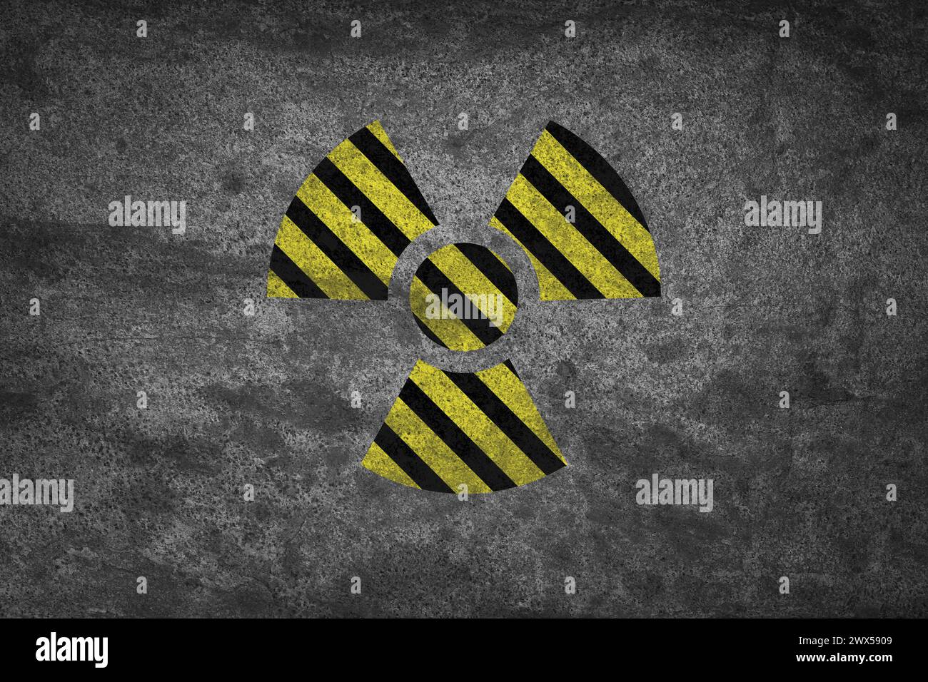 Radioactive sign on grey stone wall. Hazard symbol Stock Photo - Alamy