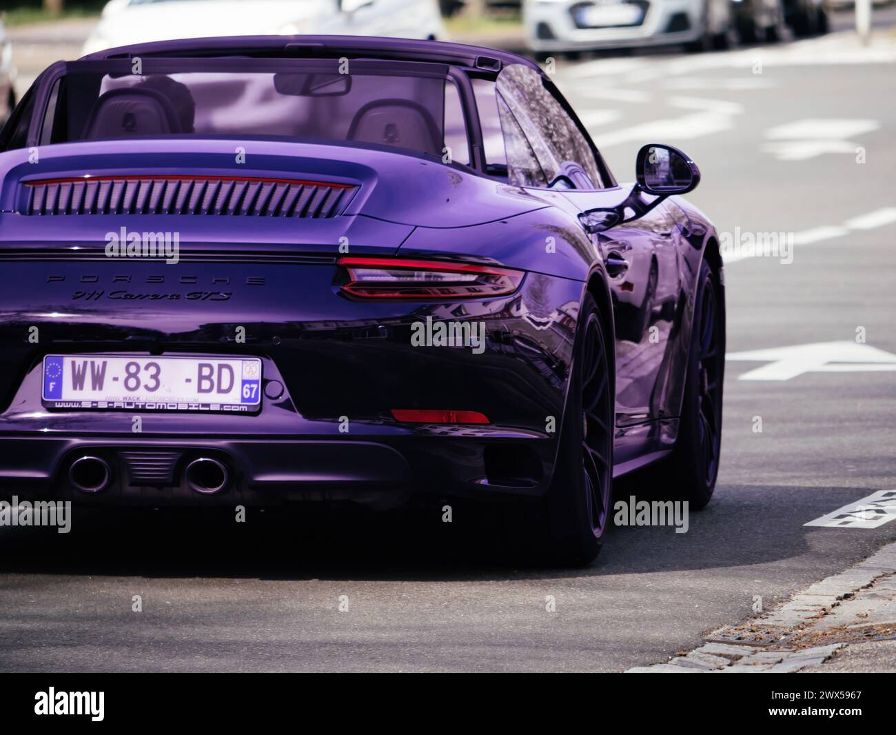 Haguenau, France - Mar 20, 2024: A purple Porsche 911 Carrera GTS ...