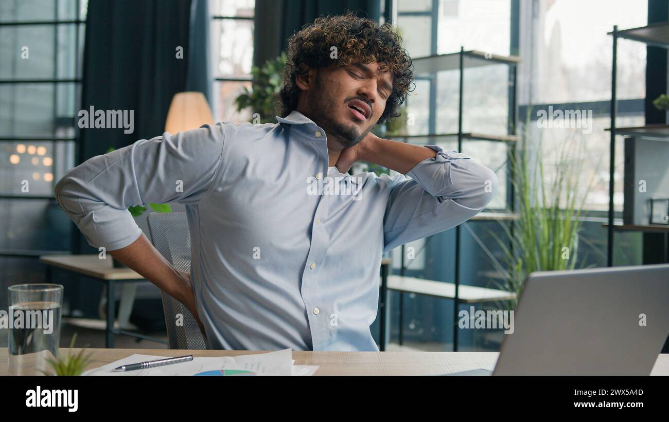 Sick exhausted Arabian Indian latino man feel pain in lower back ...