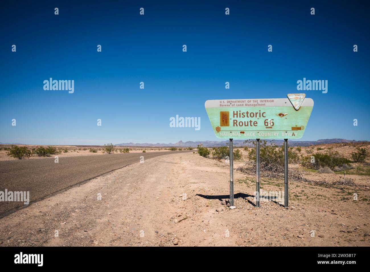 A route 66 signpost along the historic Route 66 highway. Near Oatman ...