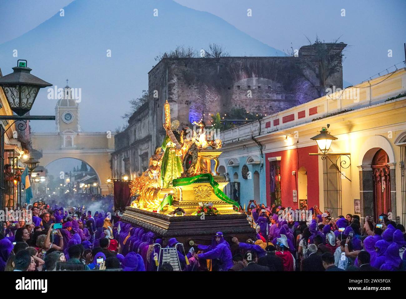 Antigua, Guatemala. 27th Mar, 2024. Costaleros carry the massive Jesús ...