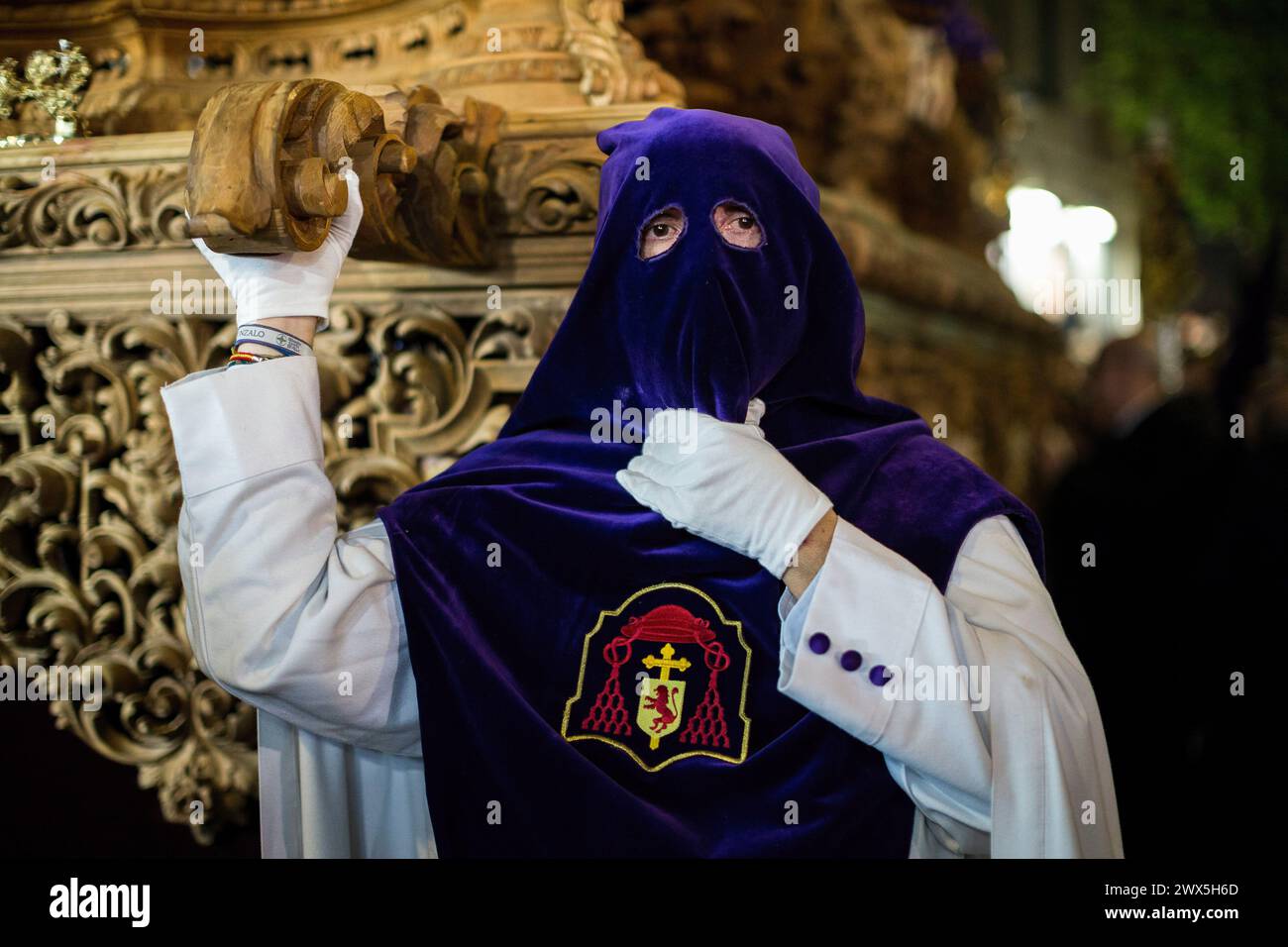 A bearer dressed as a Nazarene from the brotherhood of Nazarenes of our ...