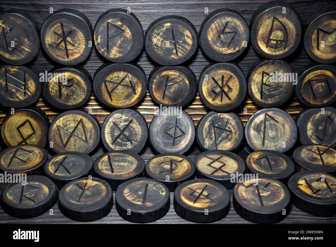 Runes carved from wood on the vintage wood background, Anglo-Saxons ...